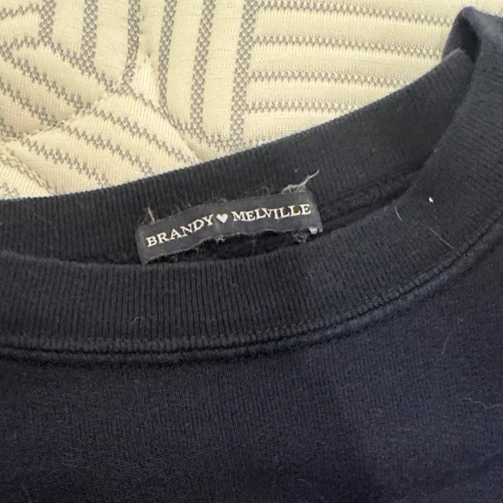 Brandy Melville | Tops | Brandy Melville Black Tokyo Graphic Sweater ...